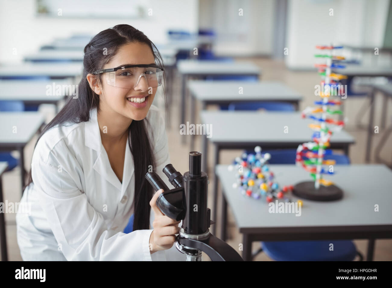 Cute school girl microscope in hi-res stock photography and images - Alamy