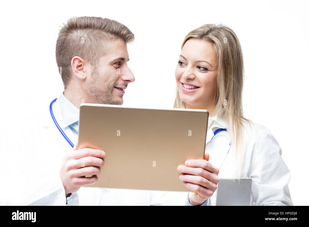 doctors discussing about exam's data looking at a digital tablet screen ...