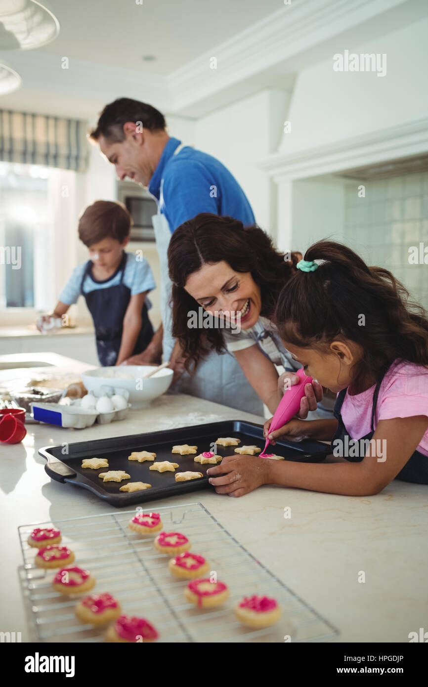 Boy mixing chocolate in kitchen hi-res stock photography and images - Alamy