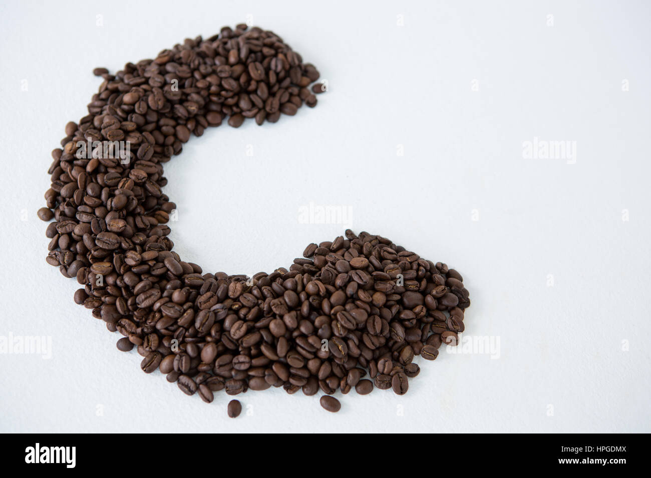 Coffee beans forming alphabet C on white background Stock Photo - Alamy