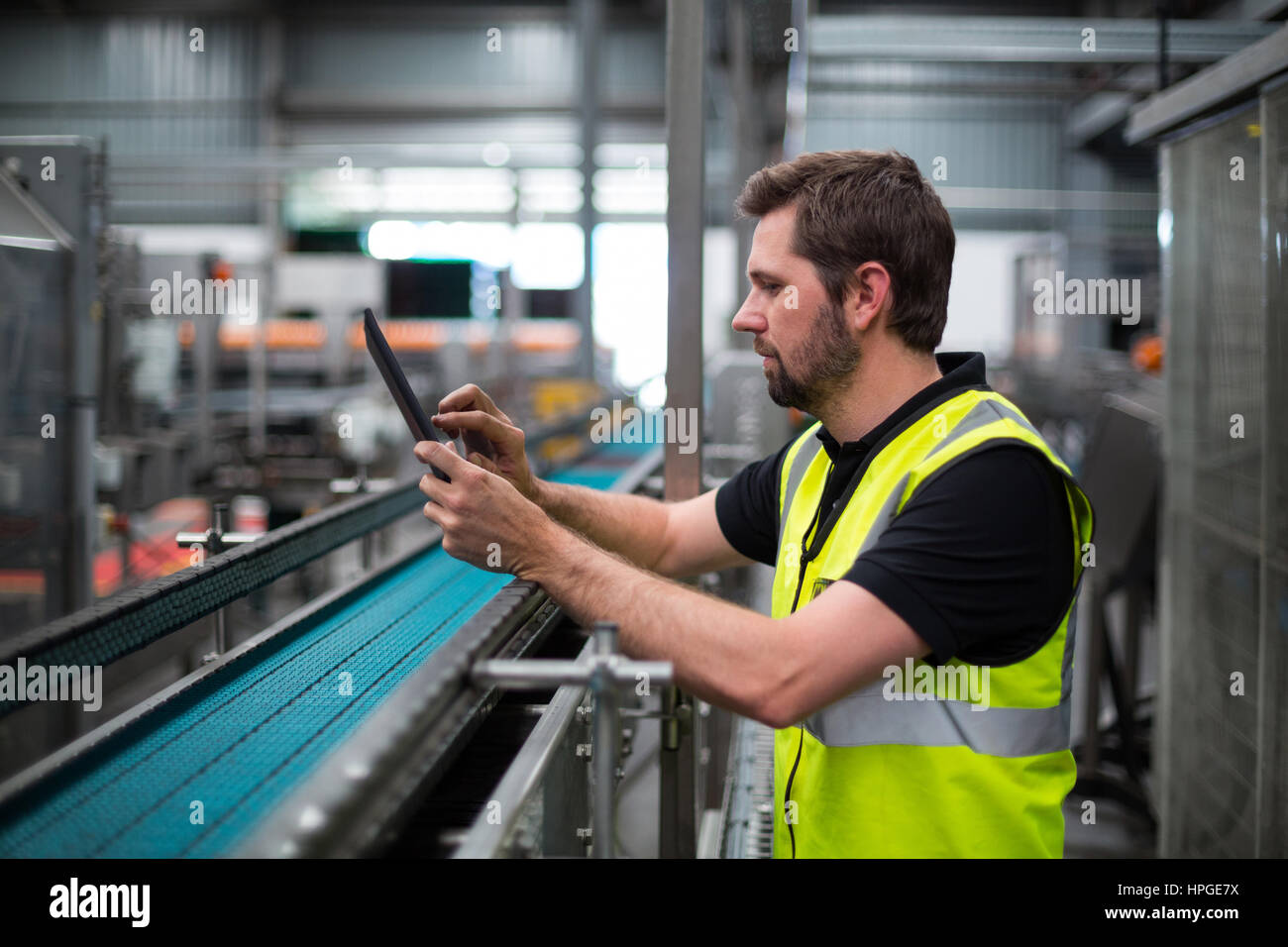 Smart factory engineer using tablet hi-res stock photography and images ...