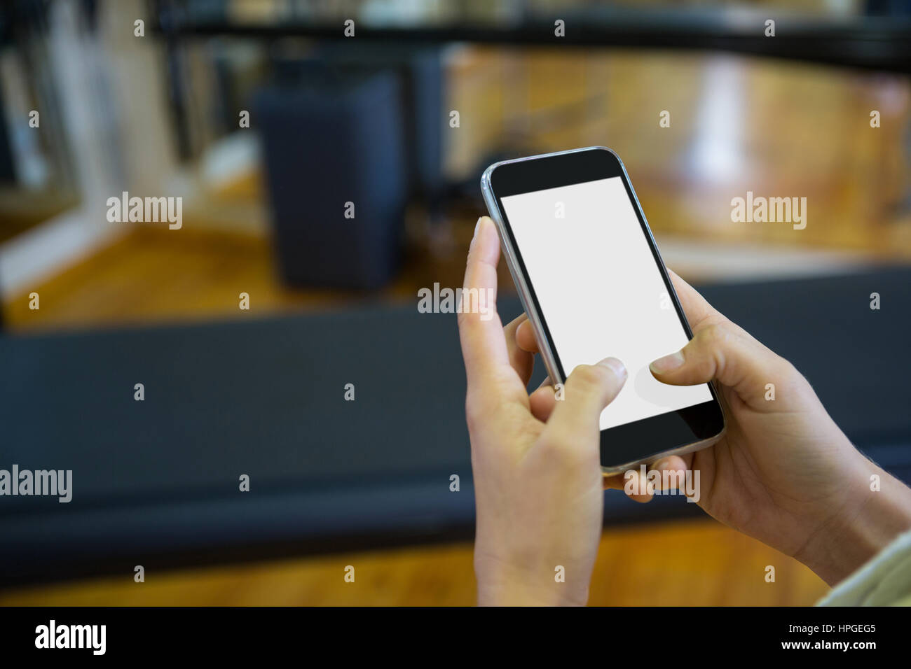 Woman texting in gym hi-res stock photography and images - Alamy