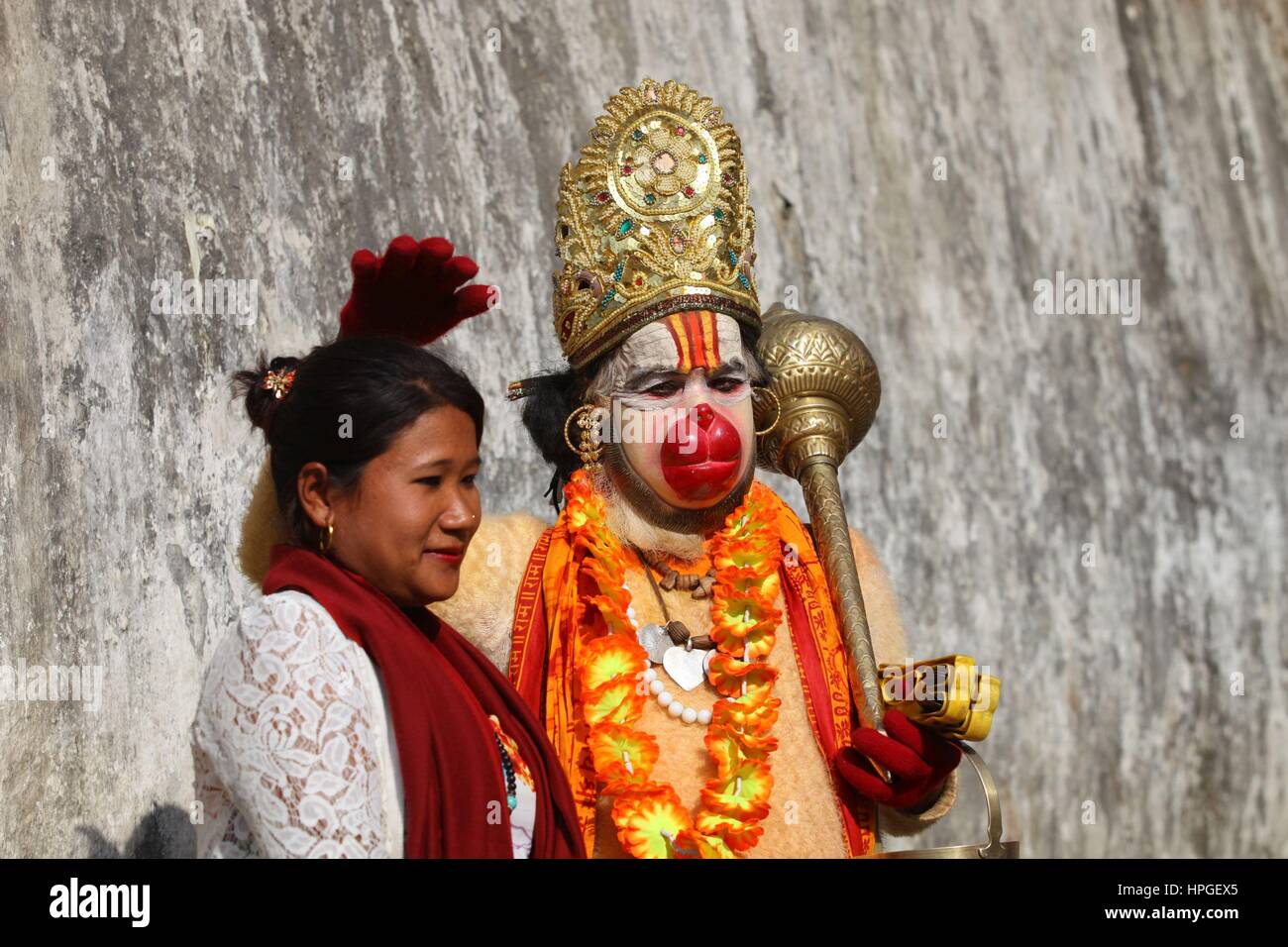 Kathmandu, Nepal. 21st Feb, 2017. A holy man bless woman ahead of ...