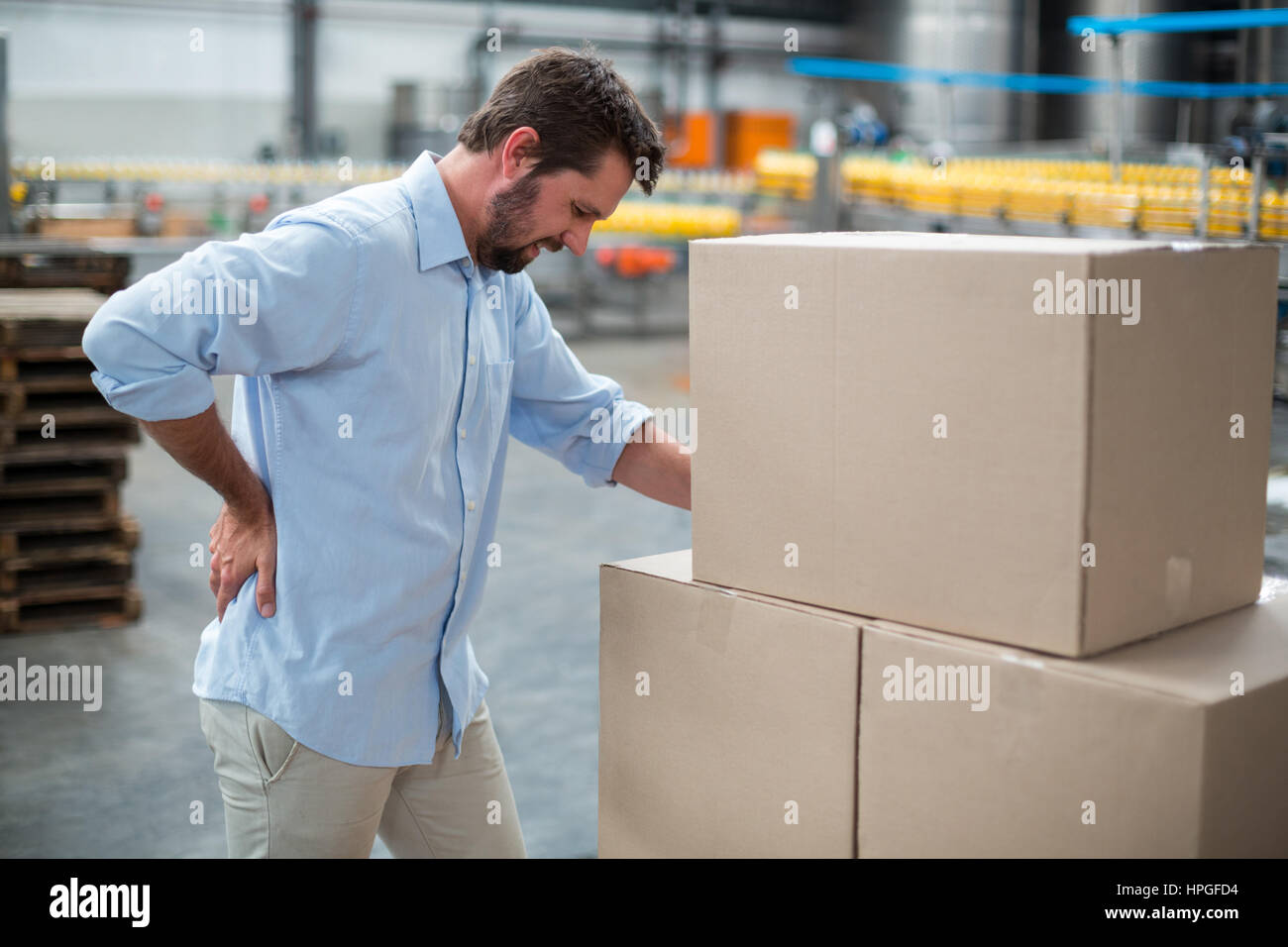 Stressed factory worker hi-res stock photography and images - Alamy
