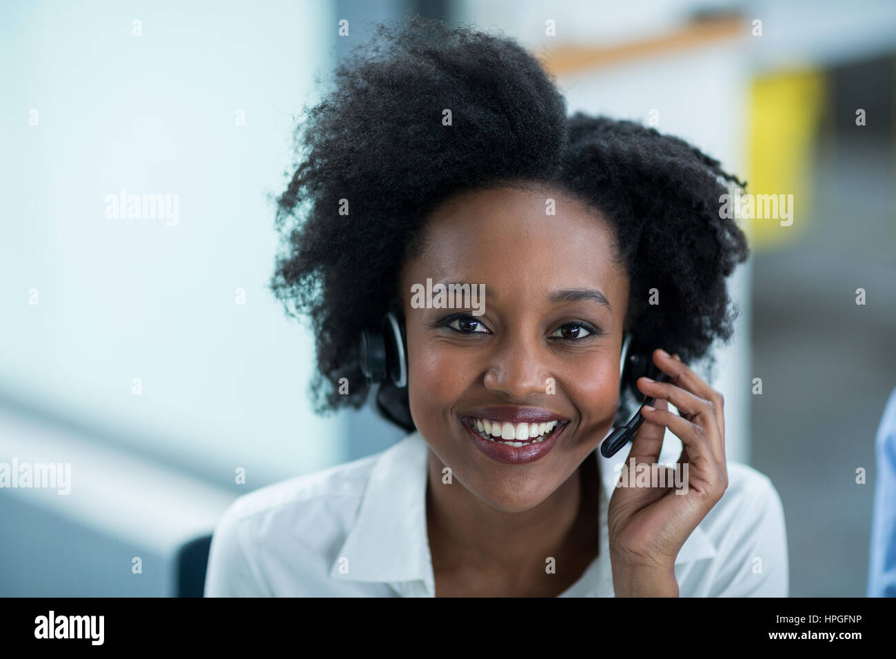 Portrait woman talking wireless headset hi-res stock photography and ...