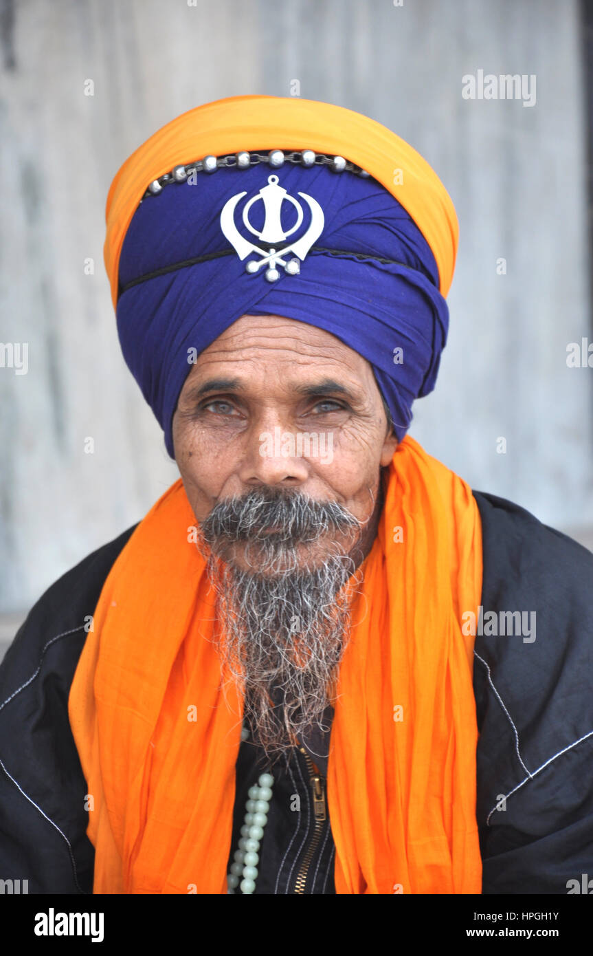 Sikh temple orange turban hi-res stock photography and images - Alamy