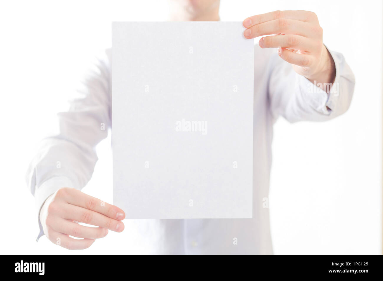 Businessman holding clear blank ready to fill Stock Photo - Alamy