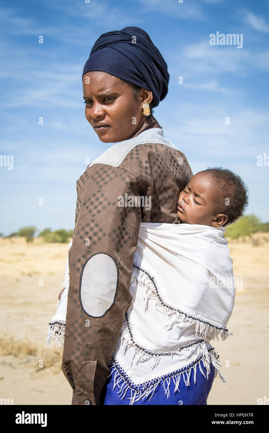 Senegalese woman and her child near Tilla village in northern Senegal ...