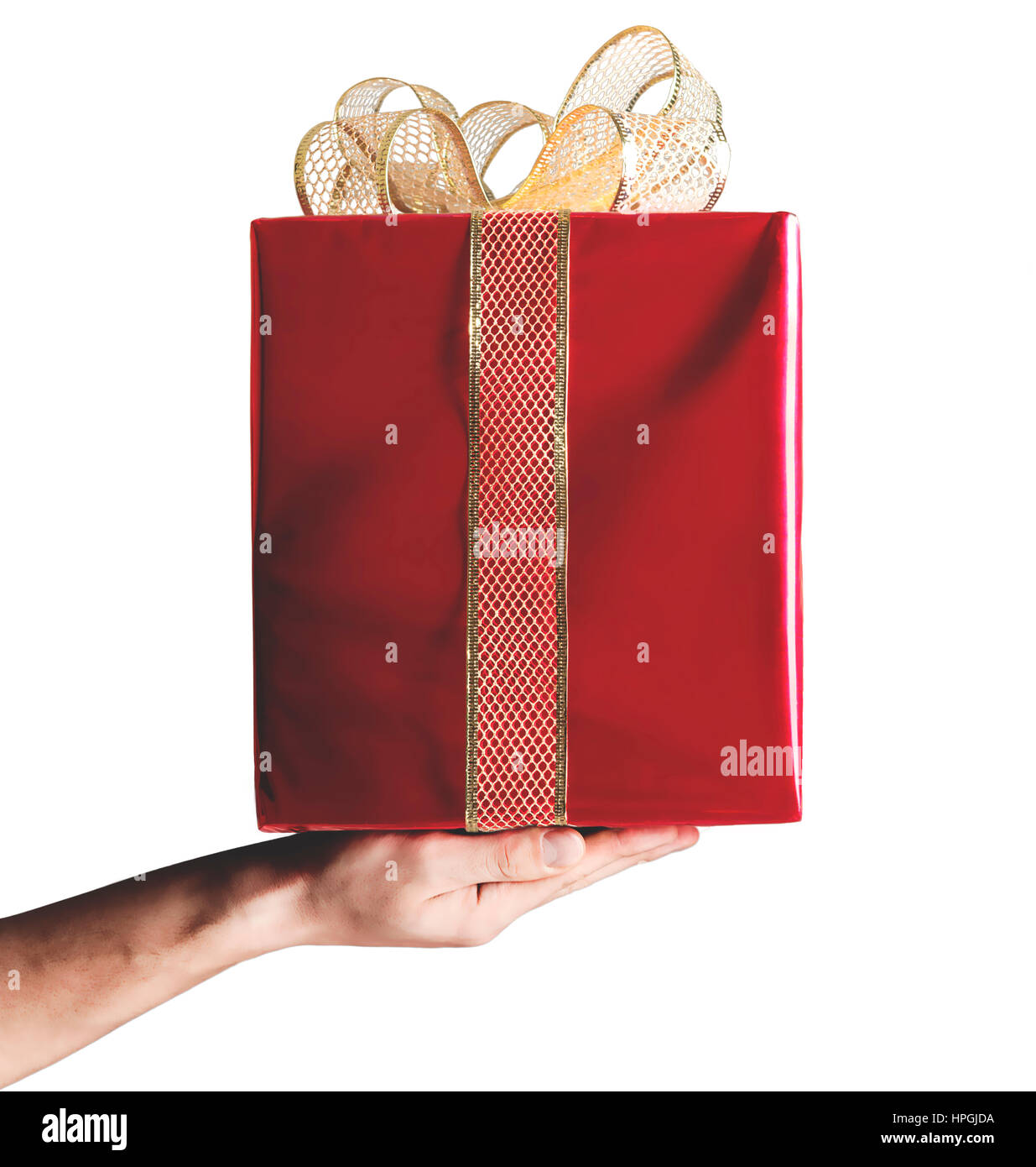 Decorated red color gift box with golden ribbon Stock Photo - Alamy