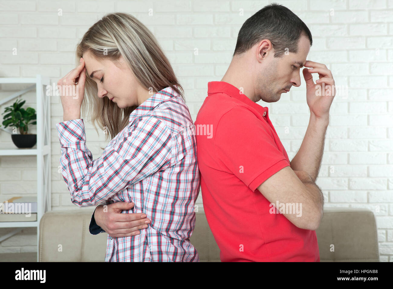 Two angry people back to back hi-res stock photography and images - Alamy