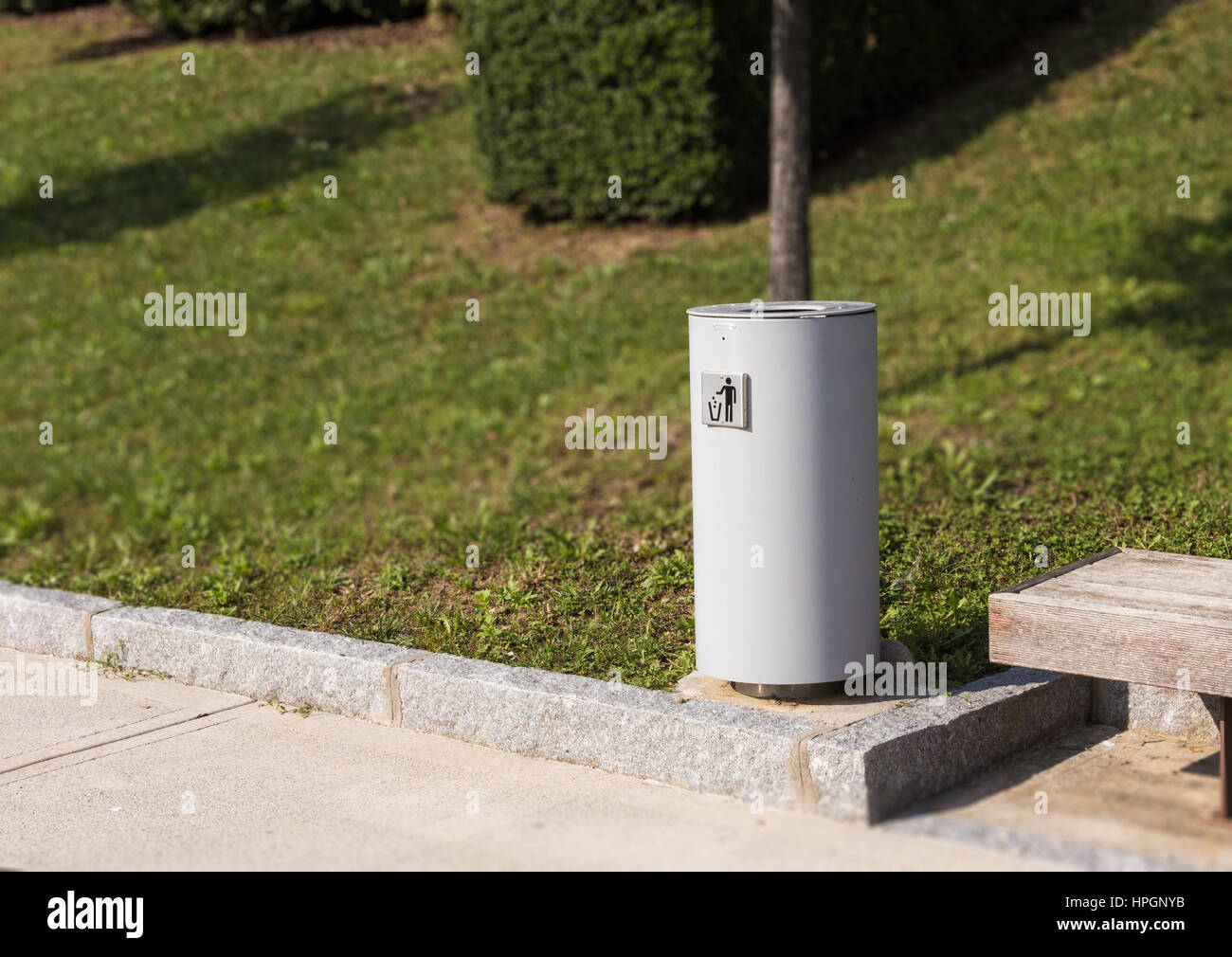 garbage bin in the park Stock Photo - Alamy