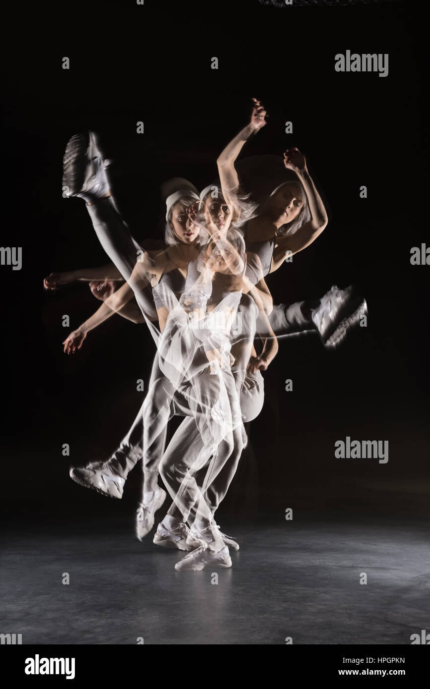 woman in sports clothing dancing Stock Photo - Alamy