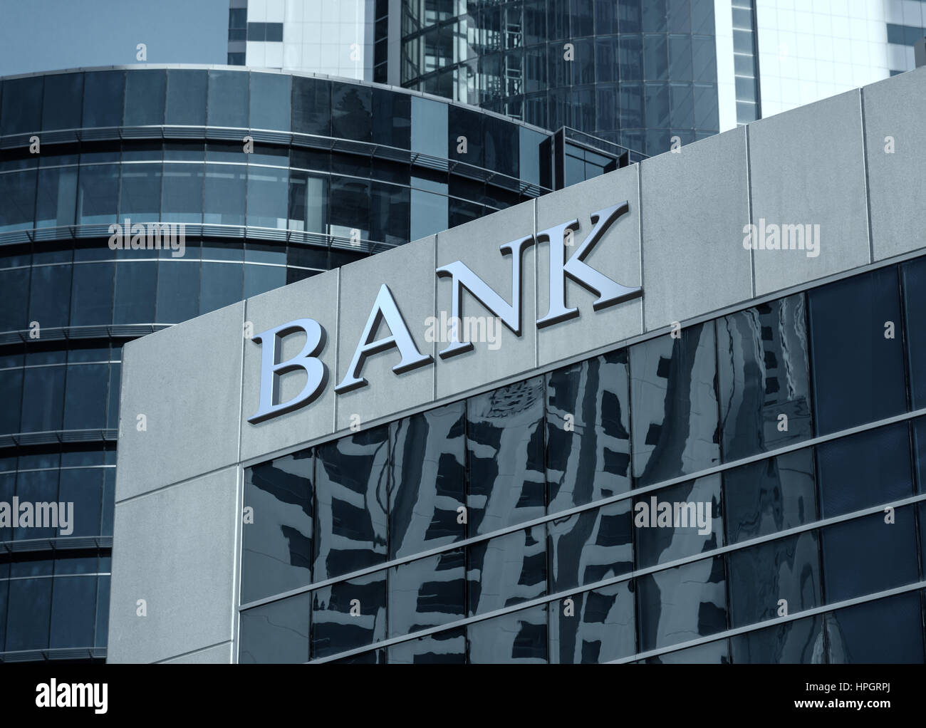 Bank sign on glass wall of business center Stock Photo - Alamy