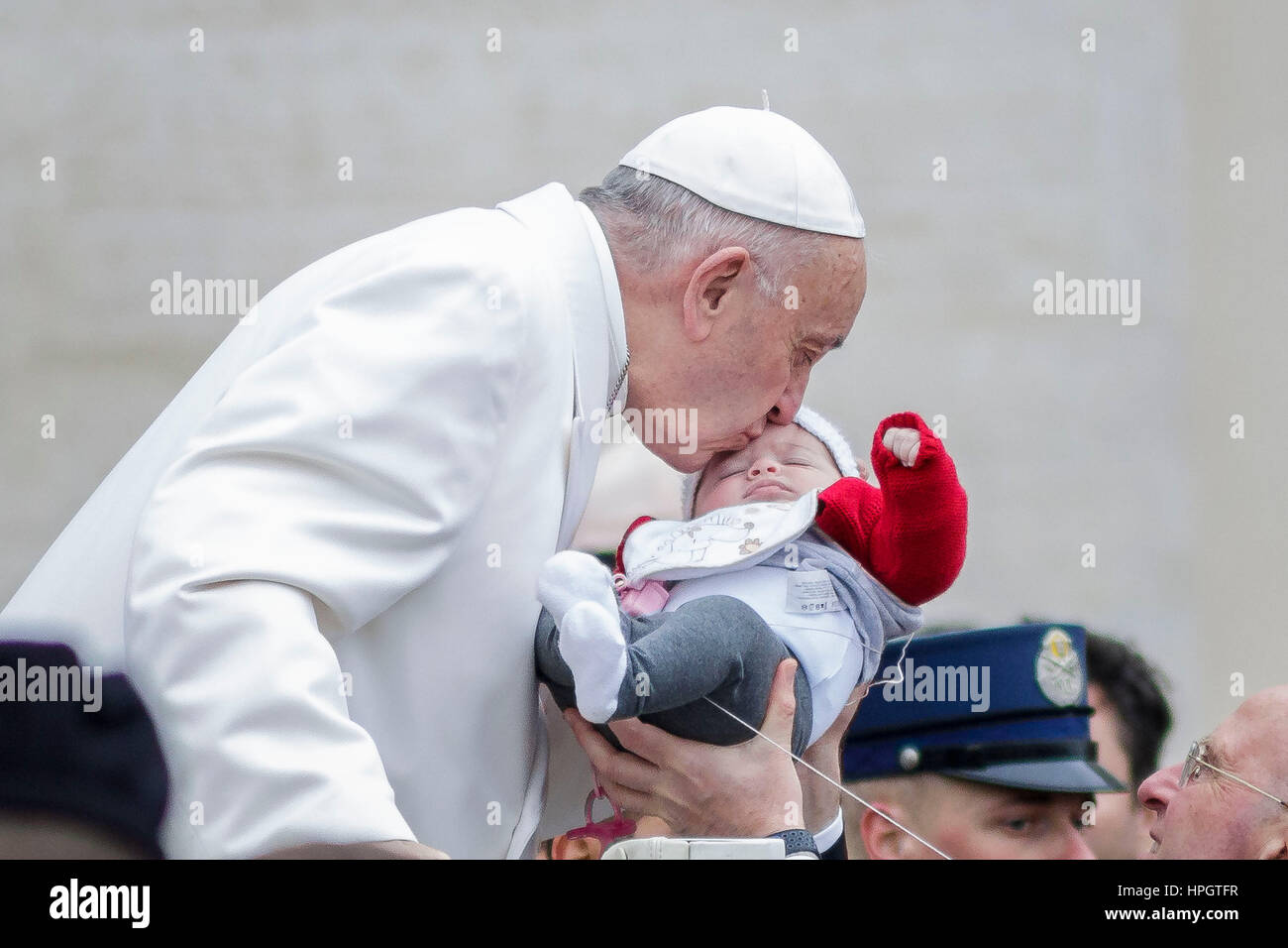 Vatican City, Vatican. 22nd Feb, 2017. Pope Francis kisses a baby as he ...