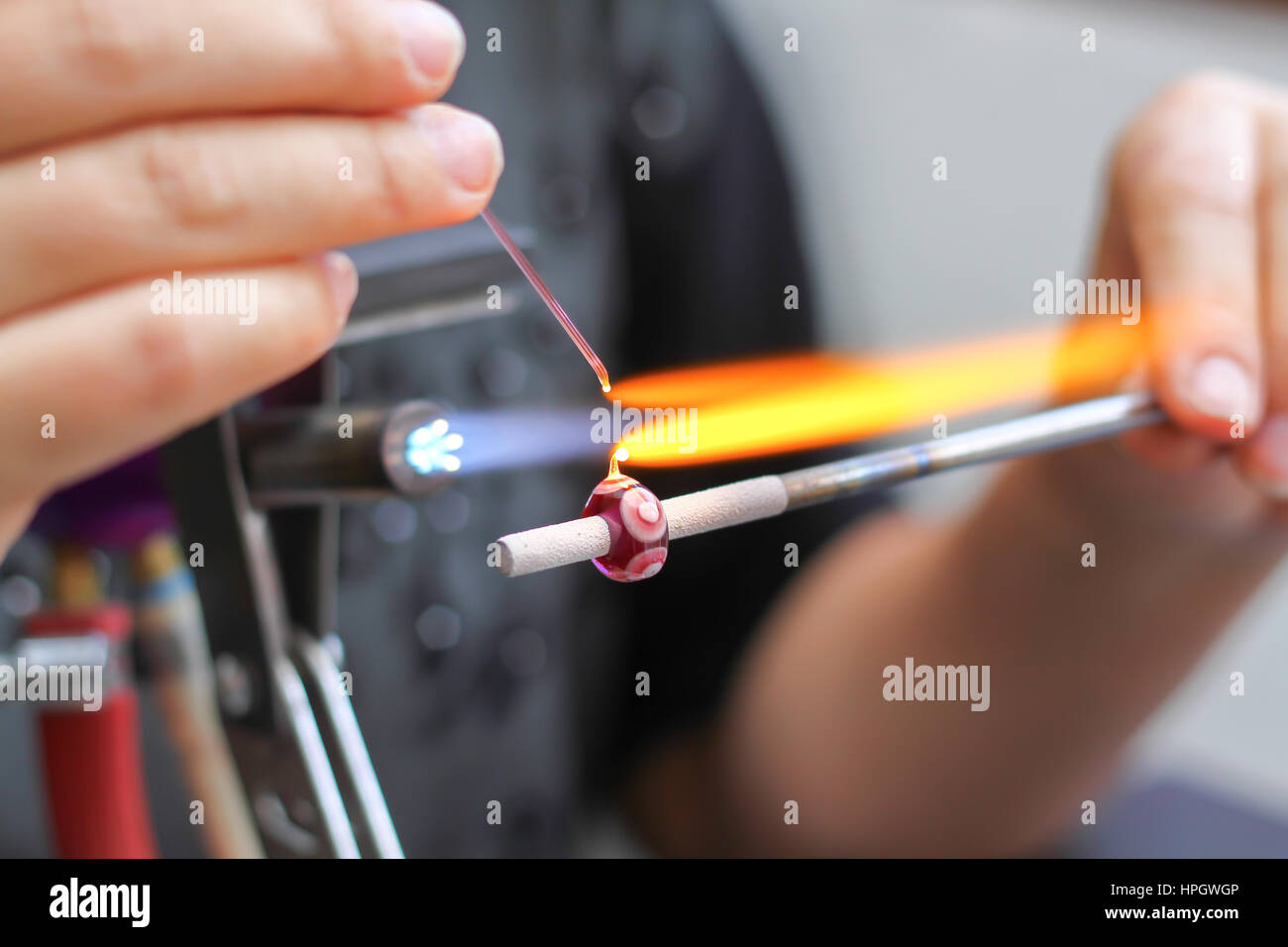 Manual production glass bead hi-res stock photography and images - Alamy