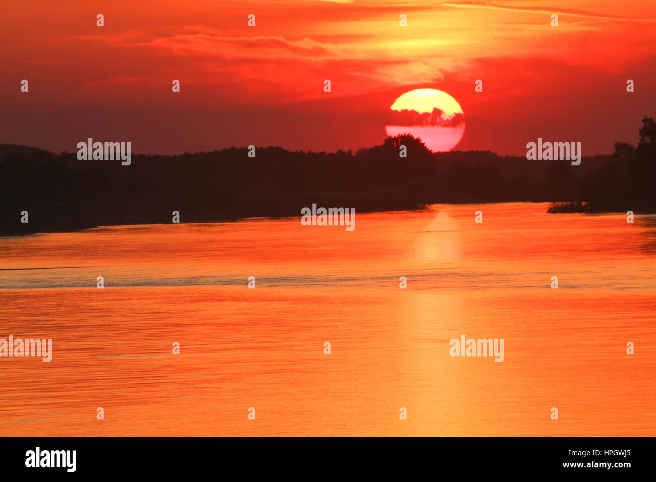 Sunset on the river Stock Photo - Alamy