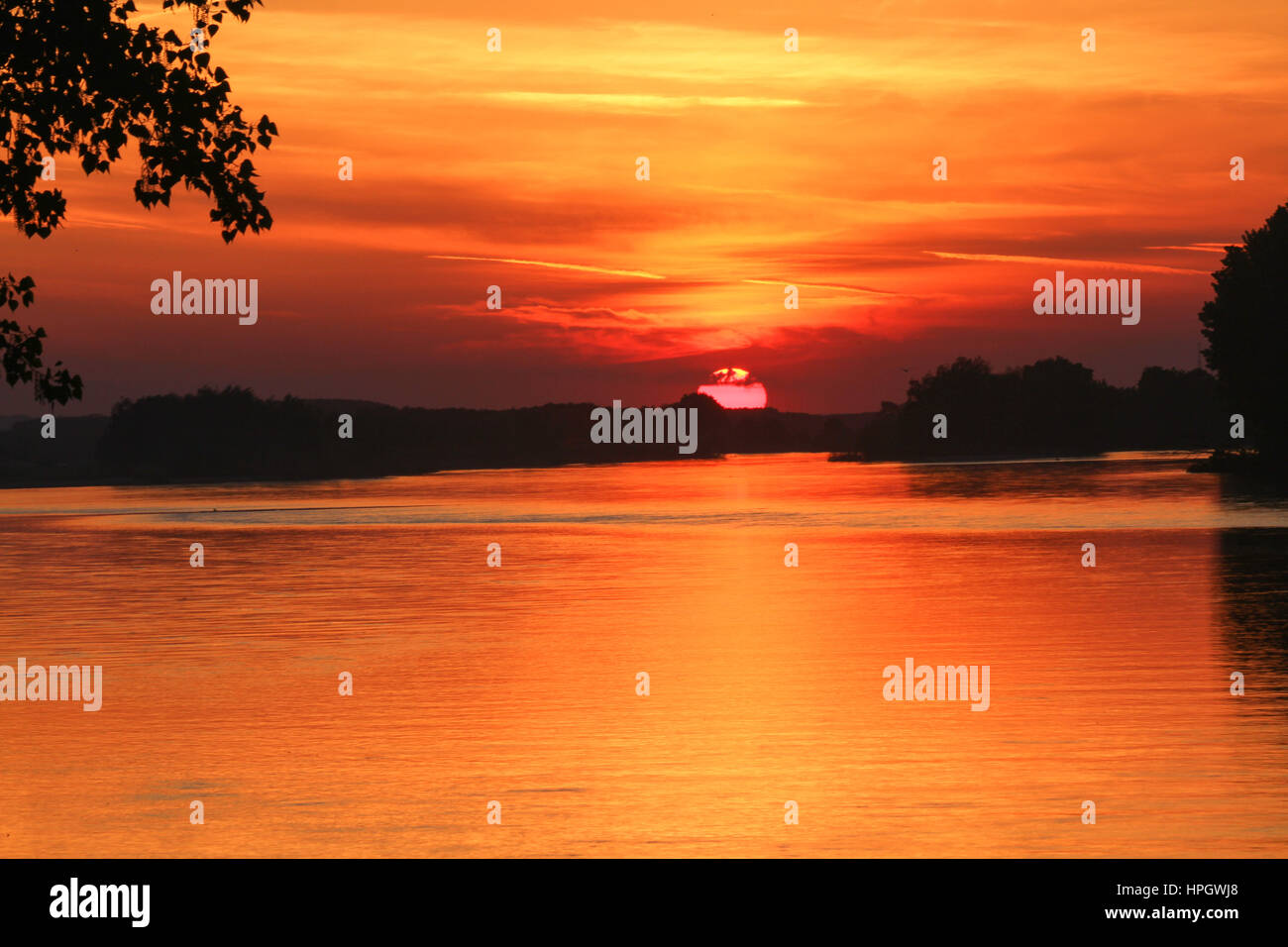 Sunset on the river Stock Photo - Alamy