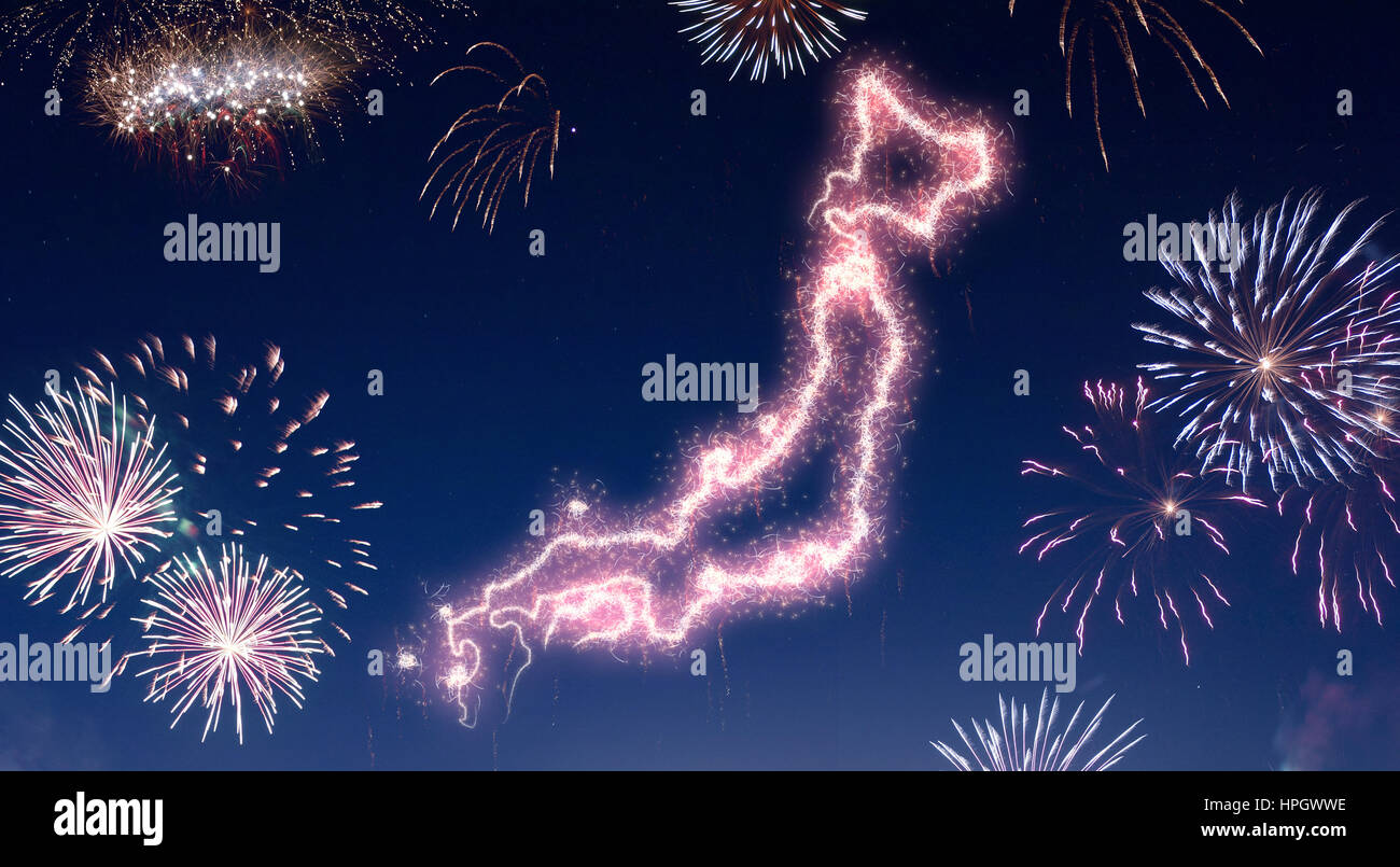 A dark night sky with a sparkling red firecracker in the shape of Japan ...