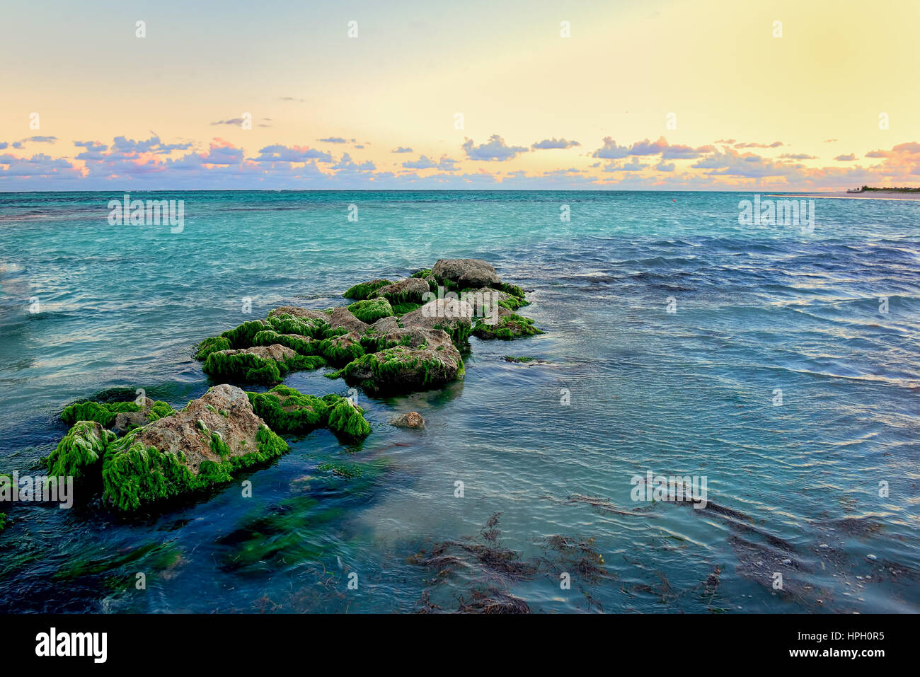 Caribbean rocky coast at dusk. Beautiful rocky sea beach, rocky shore ...