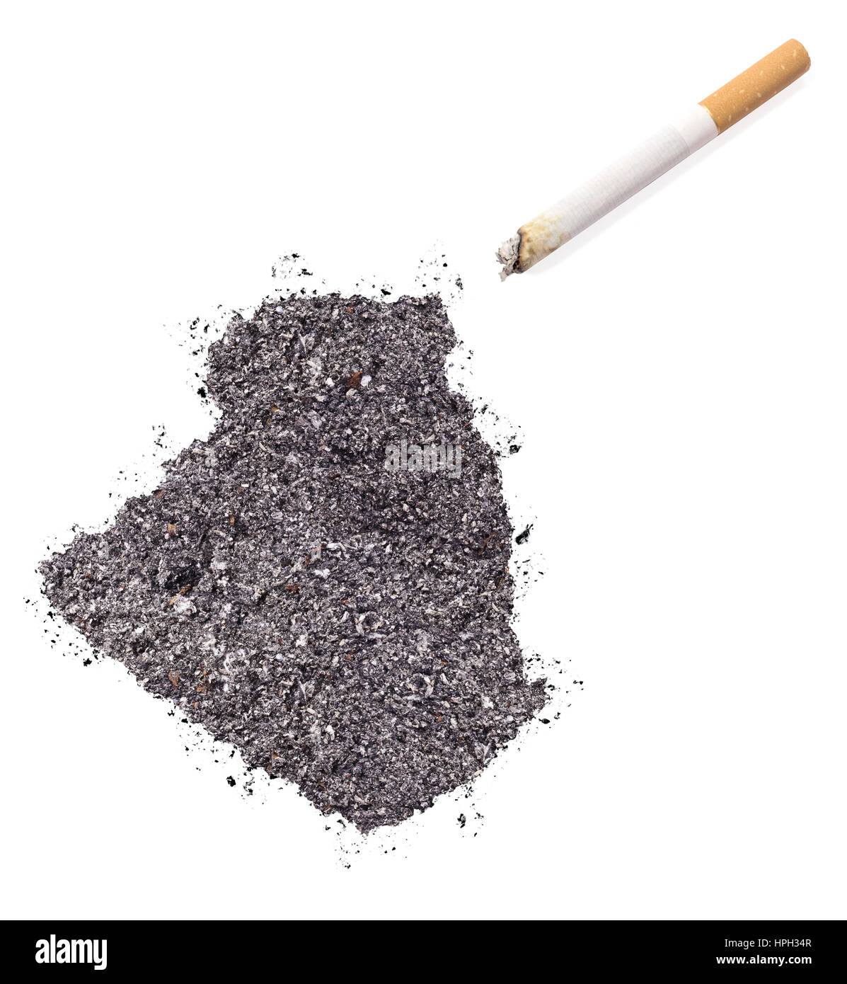 The country shape of Algeria made of tobacco ash and a cigarette ...