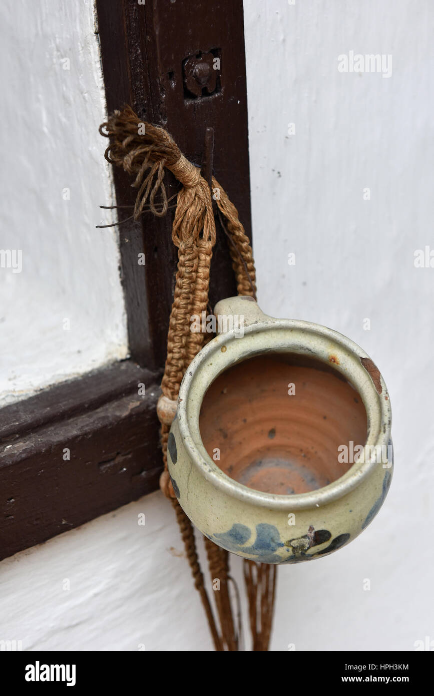 Hanging old, vintage clay jug, pot Stock Photo - Alamy
