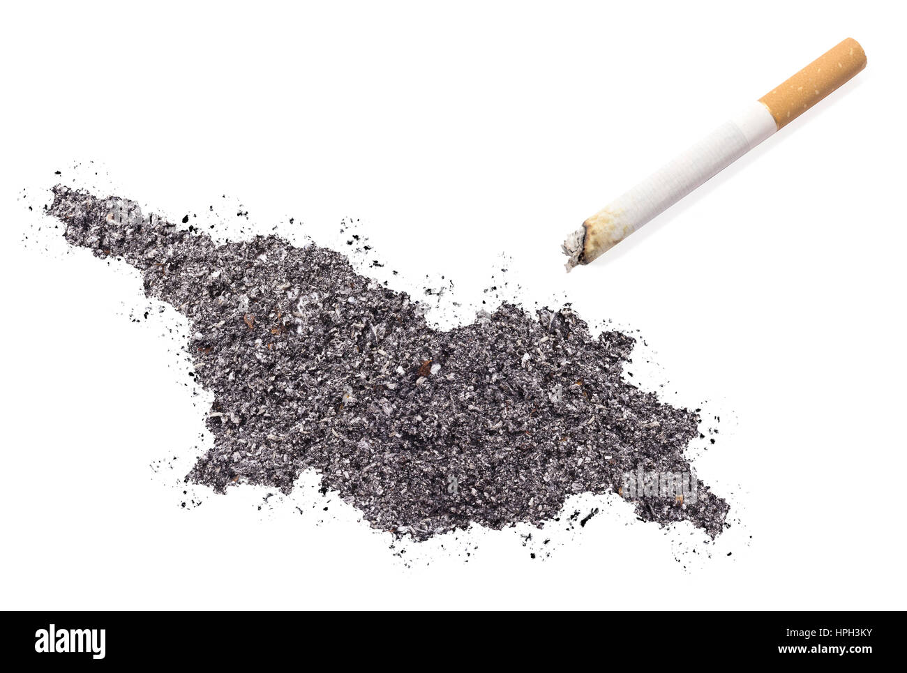 The country shape of Georgia made of tobacco ash and a cigarette ...
