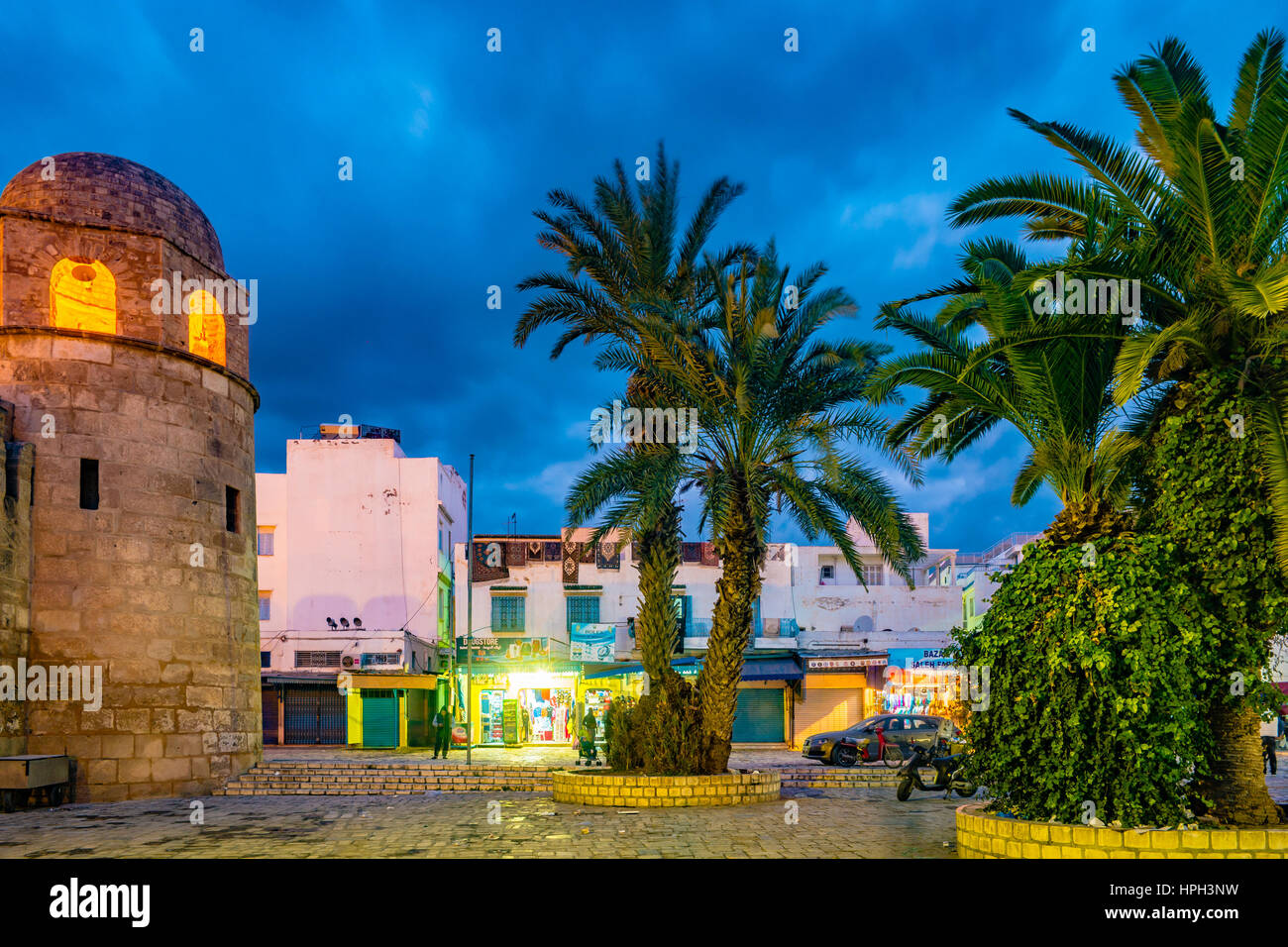 Night photo of Mosque in Sousse. Medieval architecture in night lights ...