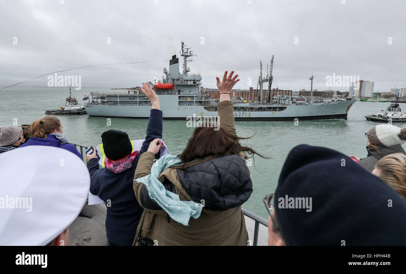 People wave as Royal Fleet Auxiliary Gold Rover passes the Round Tower ...