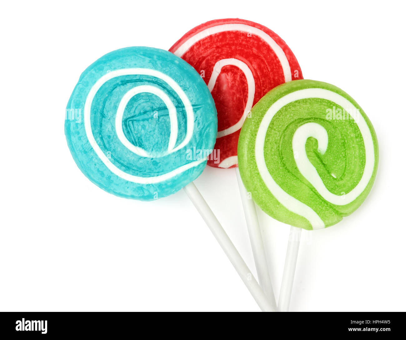 colored lollipops on a stick isolated on a white background Stock Photo ...