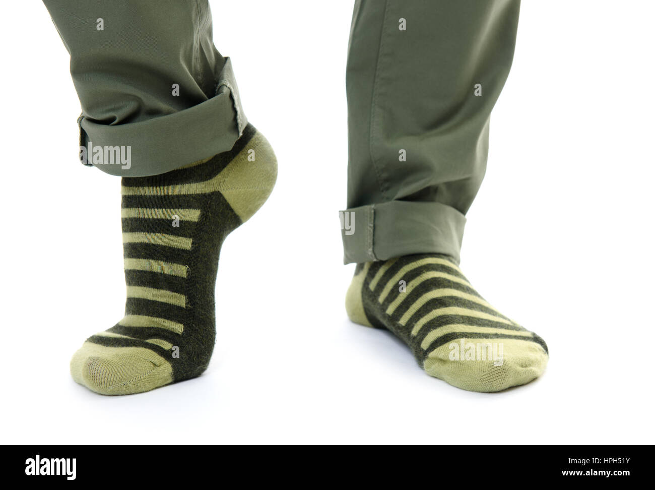 feet in fashionable socks isolated on white background Stock Photo - Alamy