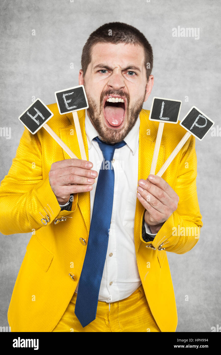 businessman screaming for help Stock Photo - Alamy