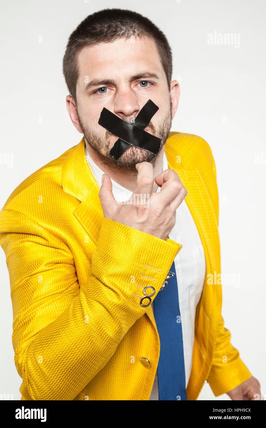 policies would break the tape from his mouth Stock Photo - Alamy