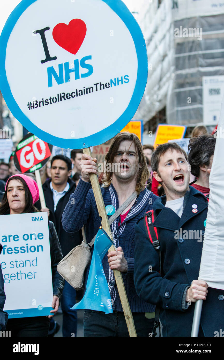 Protesters carrying placards and signs are pictured as they take part ...