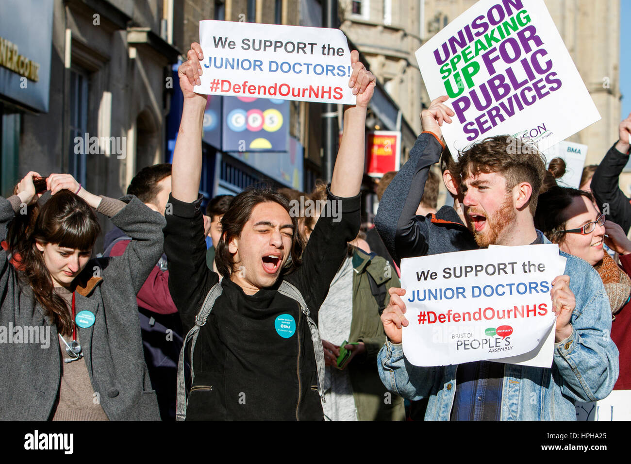 Protesters carrying placards and signs are pictured as they take part ...