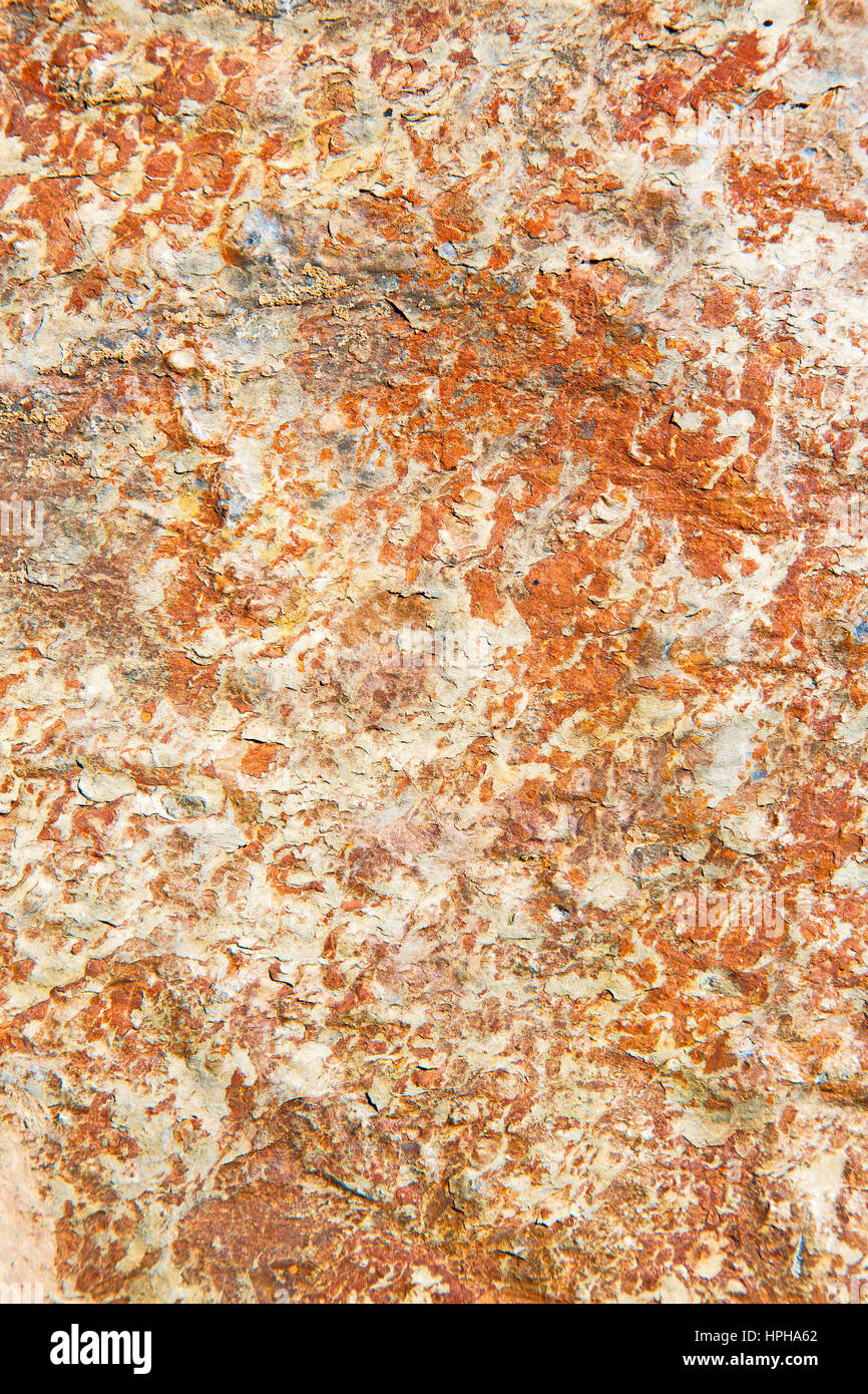 rocks stone and red orange gneiss in the wall of morocco Stock Photo ...