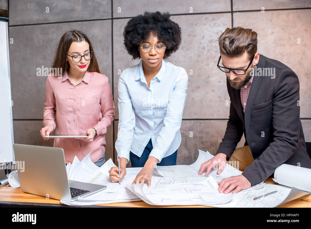 Young architects interior designers work hi-res stock photography and ...