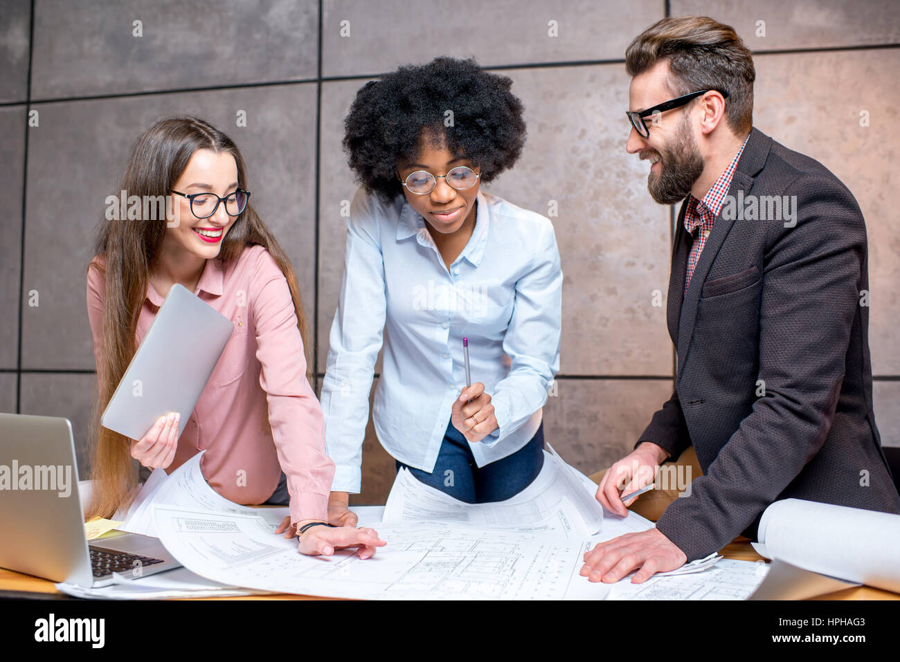 Architects working at the office Stock Photo - Alamy