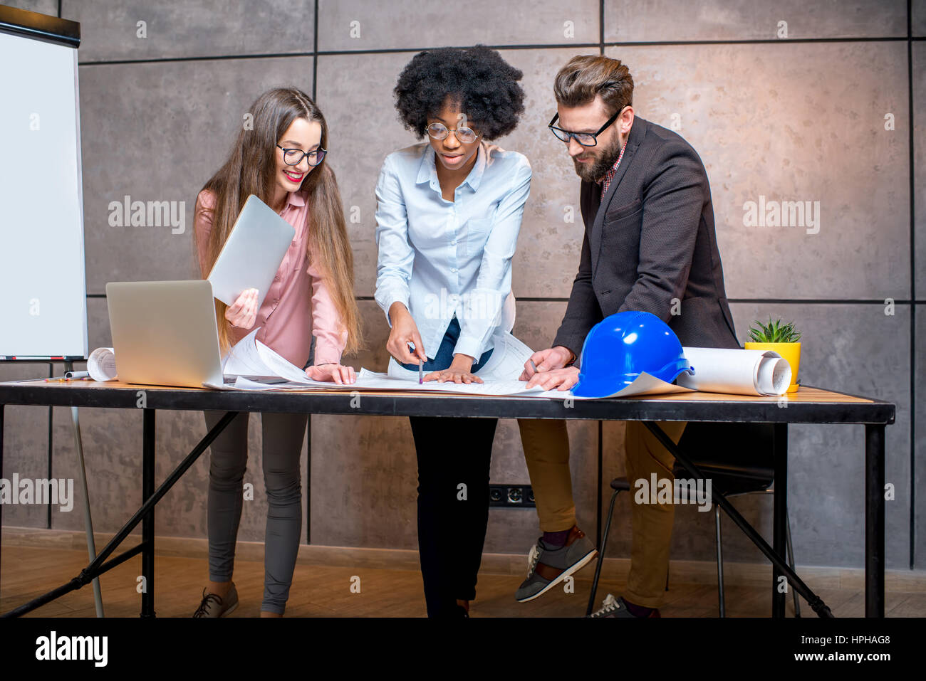 Architects working at the office Stock Photo - Alamy
