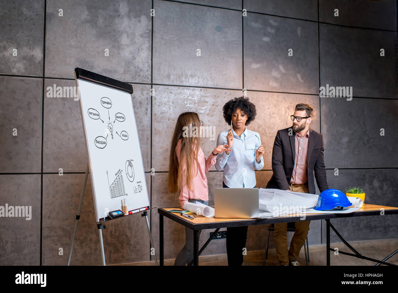 Architects working at the office Stock Photo - Alamy