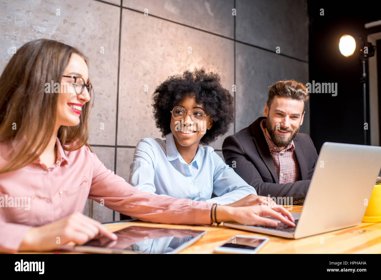 Coworkers at the office Stock Photo - Alamy