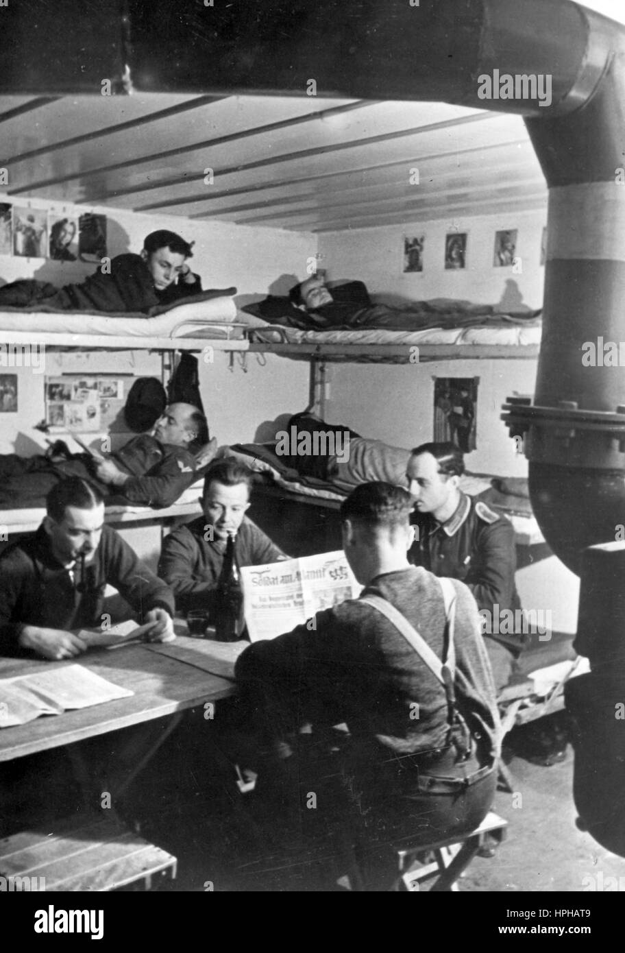 The Nazi propaganda image shows German Wehrmacht soldiers in the common ...