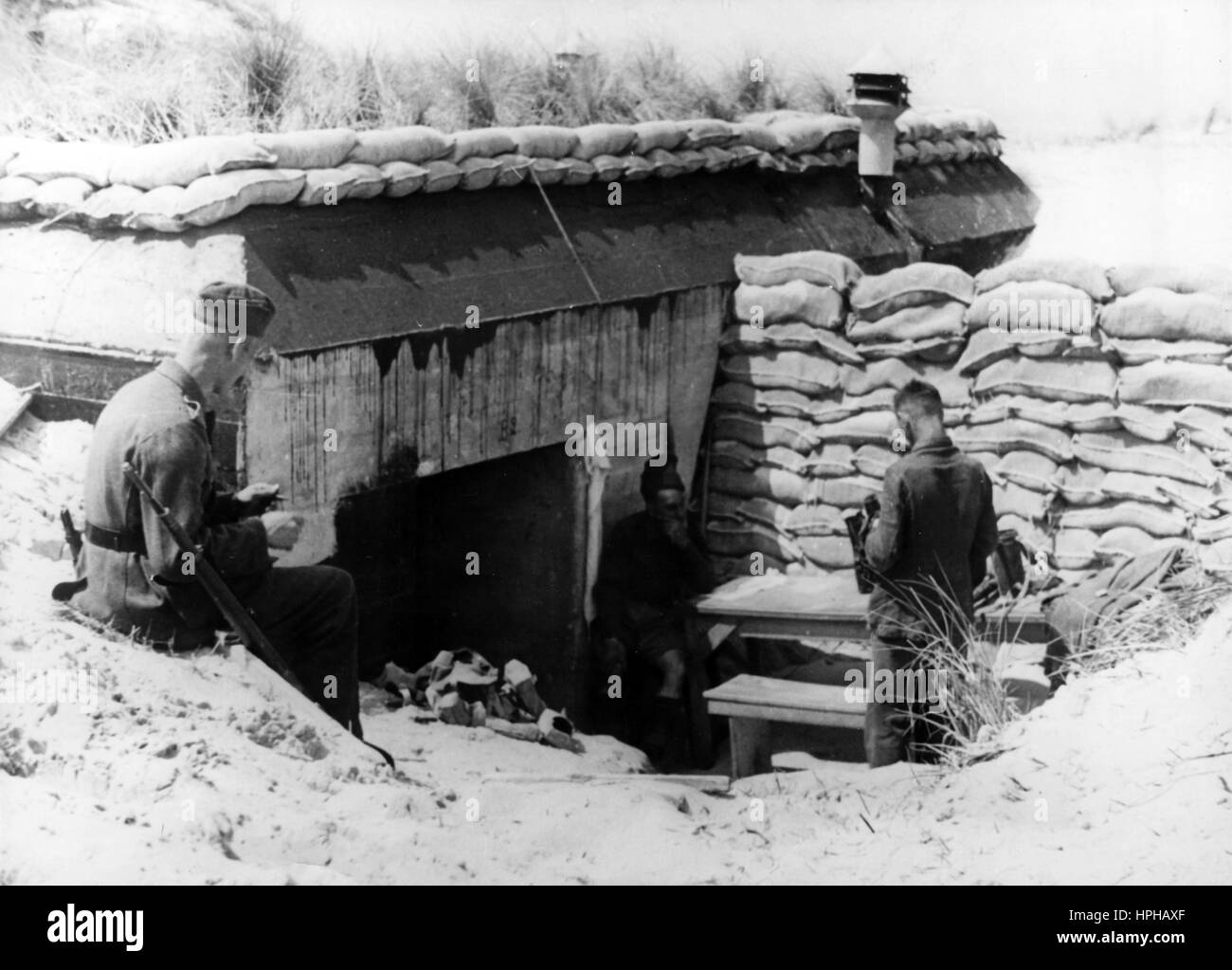 The Nazi propaganda image shows a British prisoner (m.) and a German ...