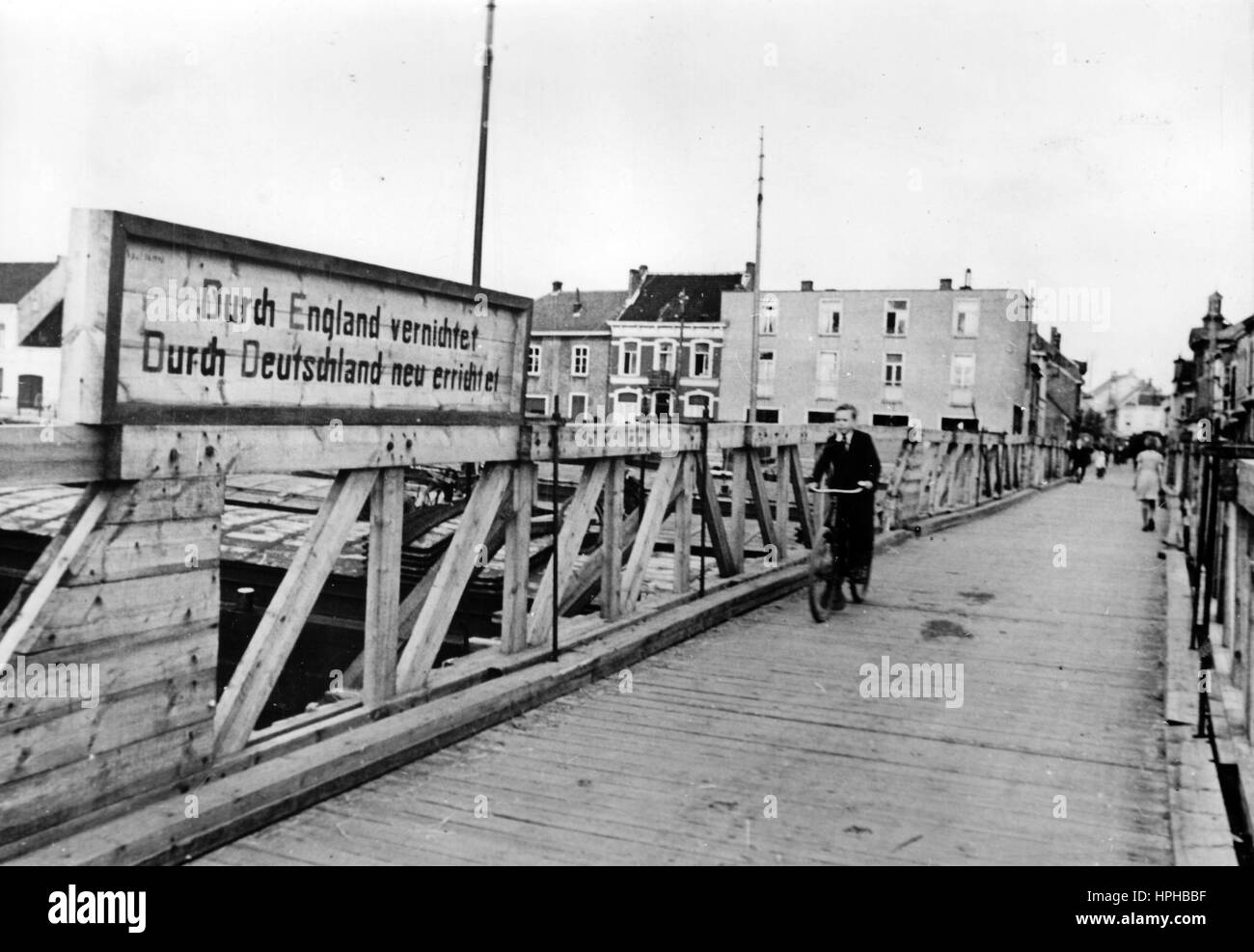 The Nazi propaganda image shows a wooden bridge going over the Gent ...