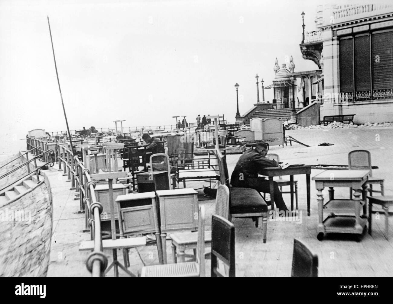 The Nazi propaganda image shows German Wehrmacht soldiers writing in an ...
