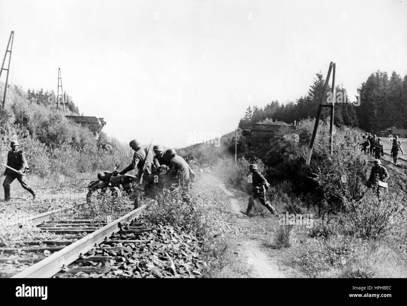 The Nazi propaganda image shows German Wehrmacht soldiers on the ...