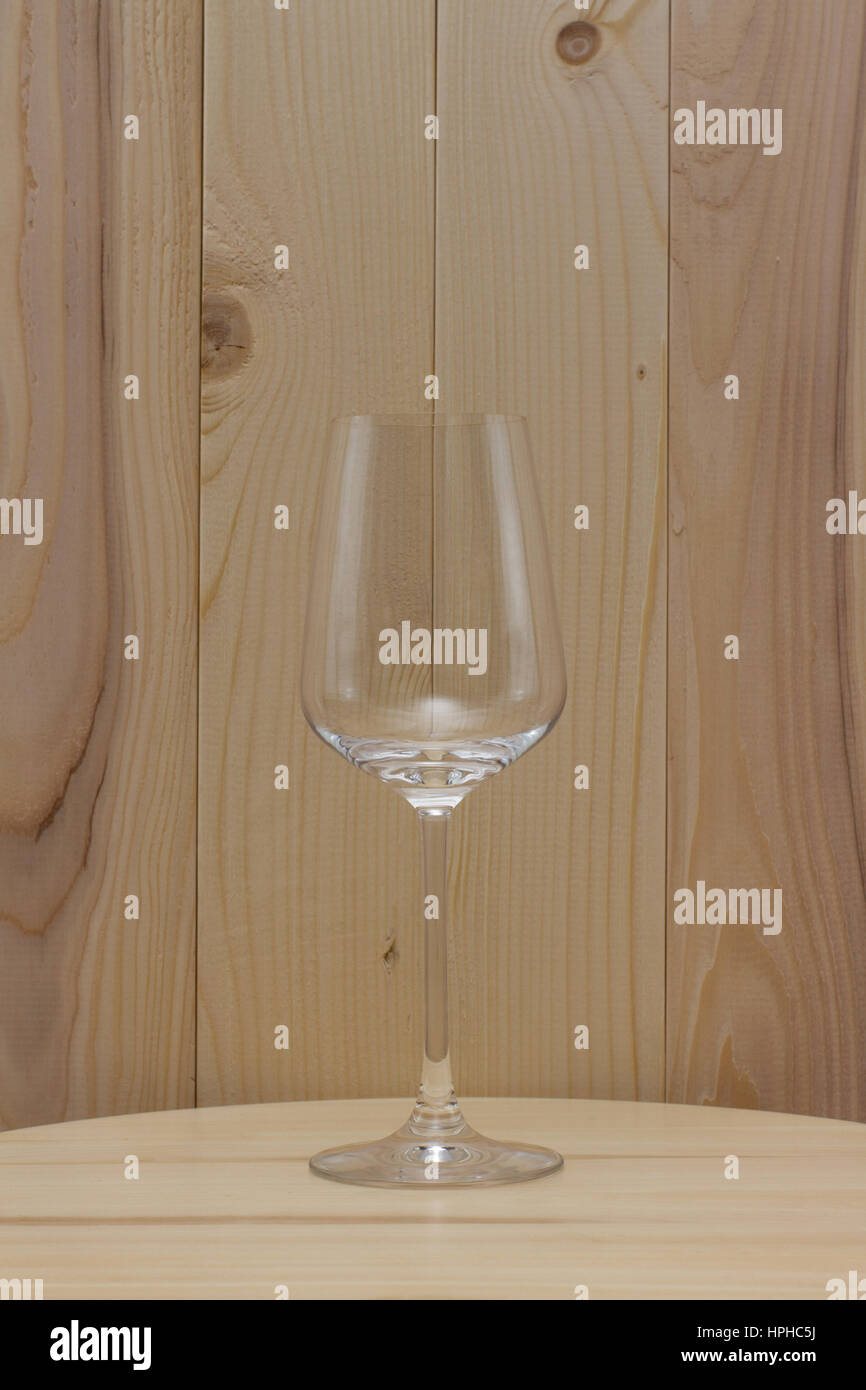 transparent glass standing stand with a wooden background Stock Photo ...