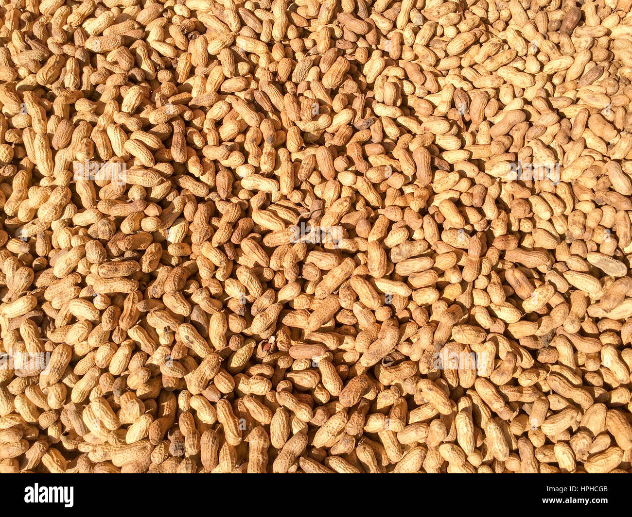 Peanuts on market display Stock Photo - Alamy
