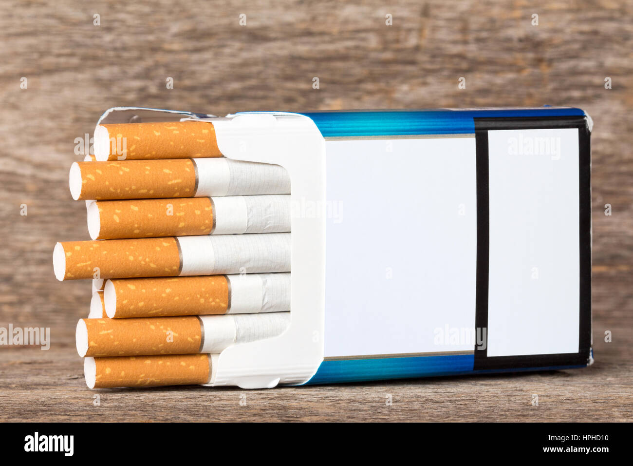 Open pack of cigarettes with cigarettes sticking out Stock Photo - Alamy