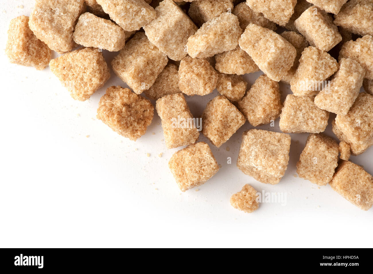 cane sugar cubes isolated on white background Stock Photo - Alamy