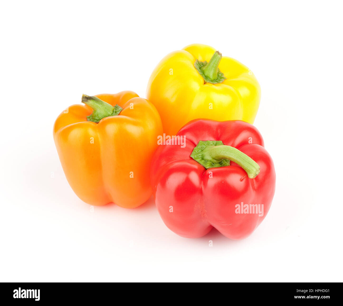 three bell peppers isolated on white background Stock Photo - Alamy